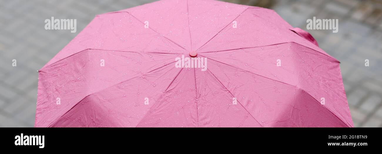 Rain falling on umbrella hi-res stock photography and images - Alamy
