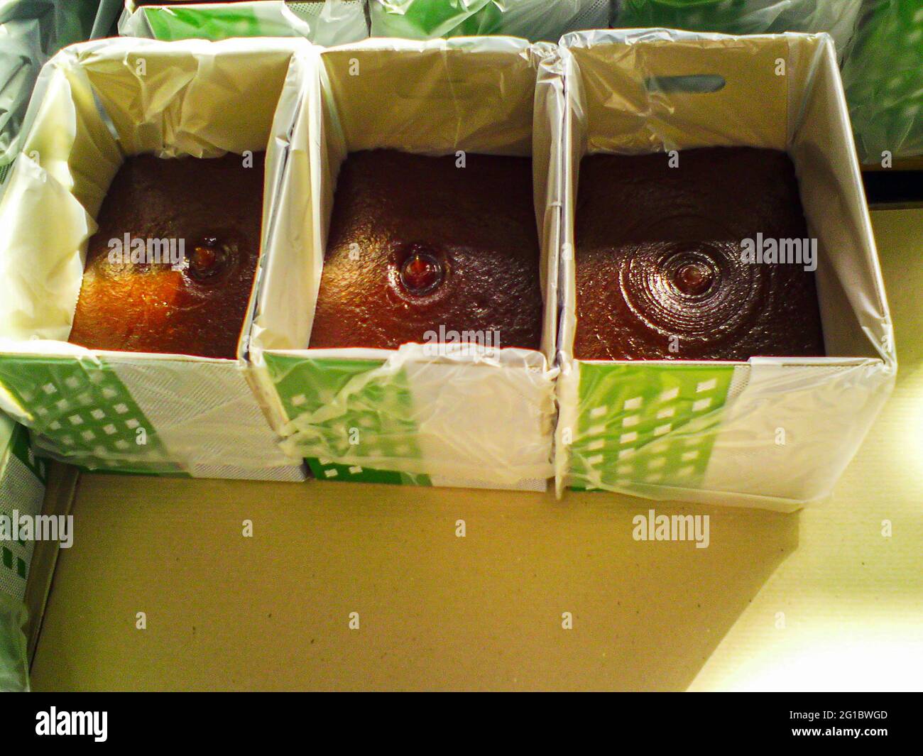Jam in boxes in production, apple jam in cardboard boxes Stock Photo ...
