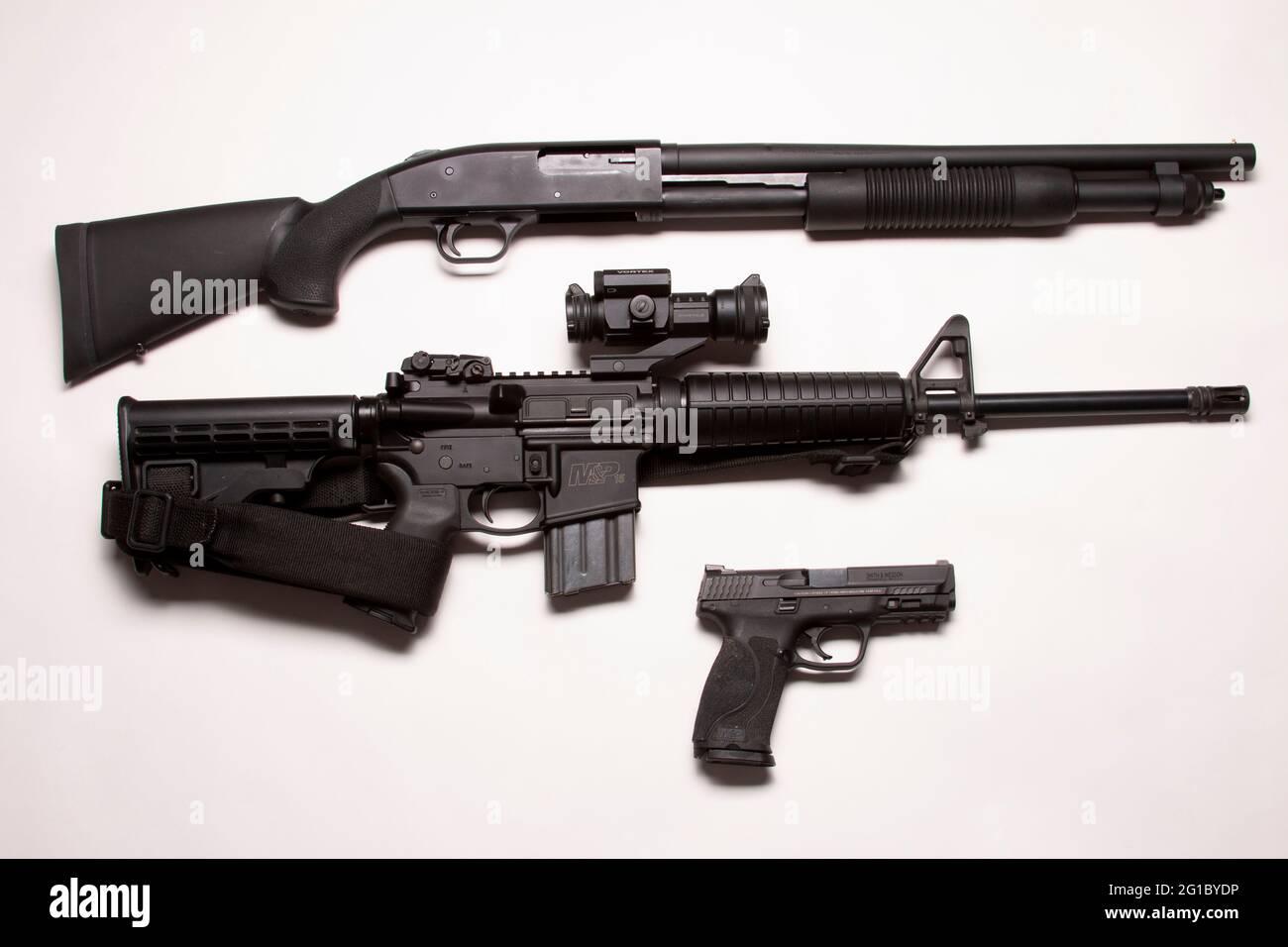 3-Gun Setup: Shotgun, AR15 Rifle, and Handgun Stock Photo - Alamy