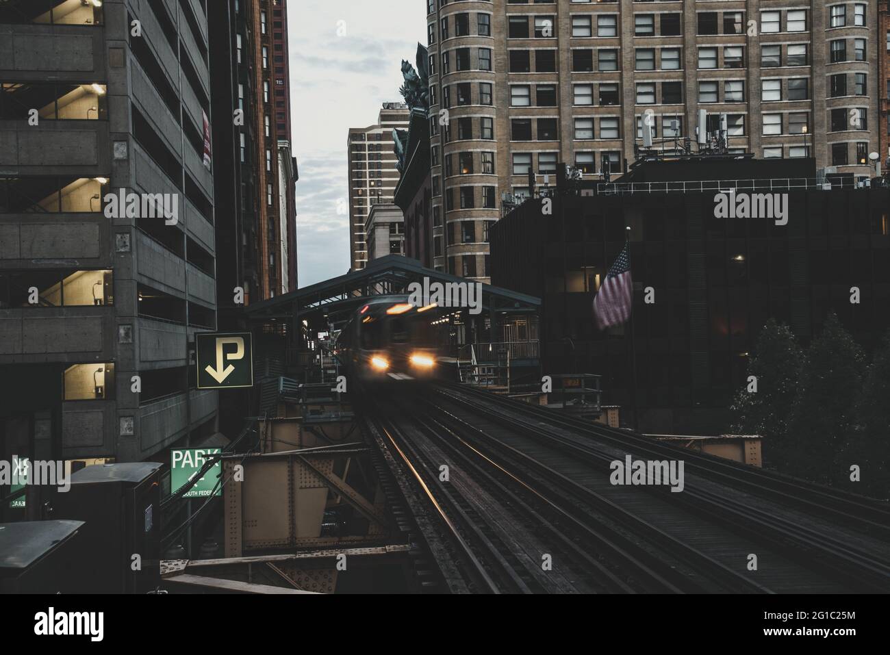 Train subway at night, Chicago, Vintage cityscape of Chicago skyline ...