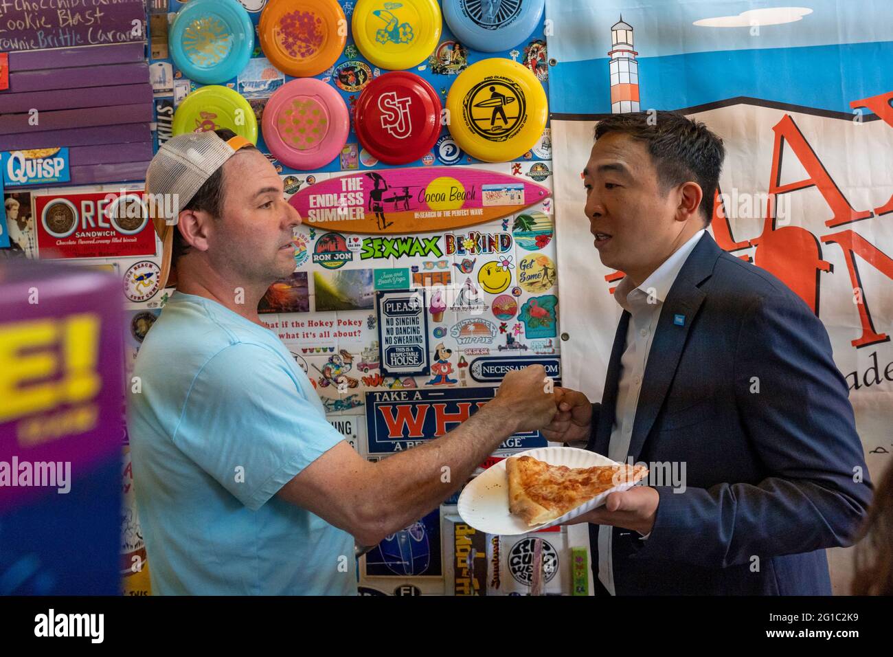 NEW YORK, NY – JUNE 06: Mayoral candidate Andrew Yang meets the owner ...