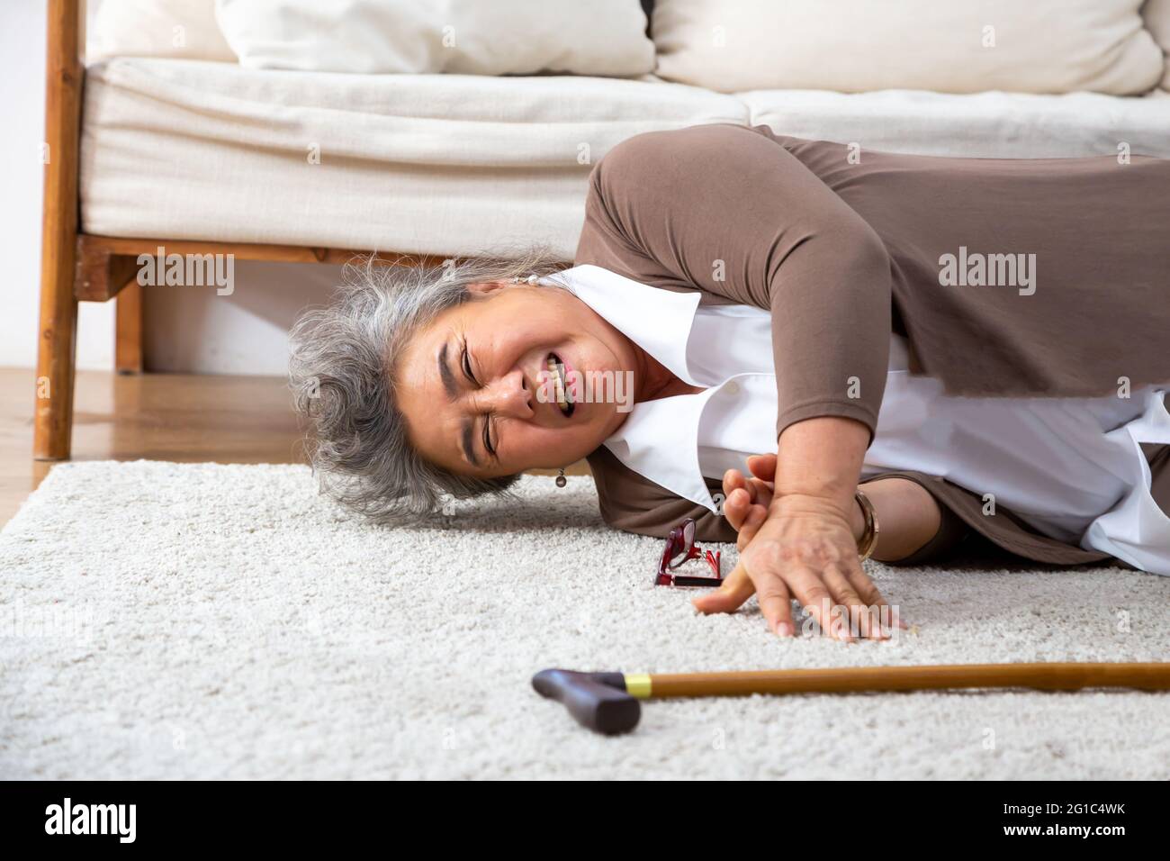 Senior woman falls down hi-res stock photography and images - Alamy