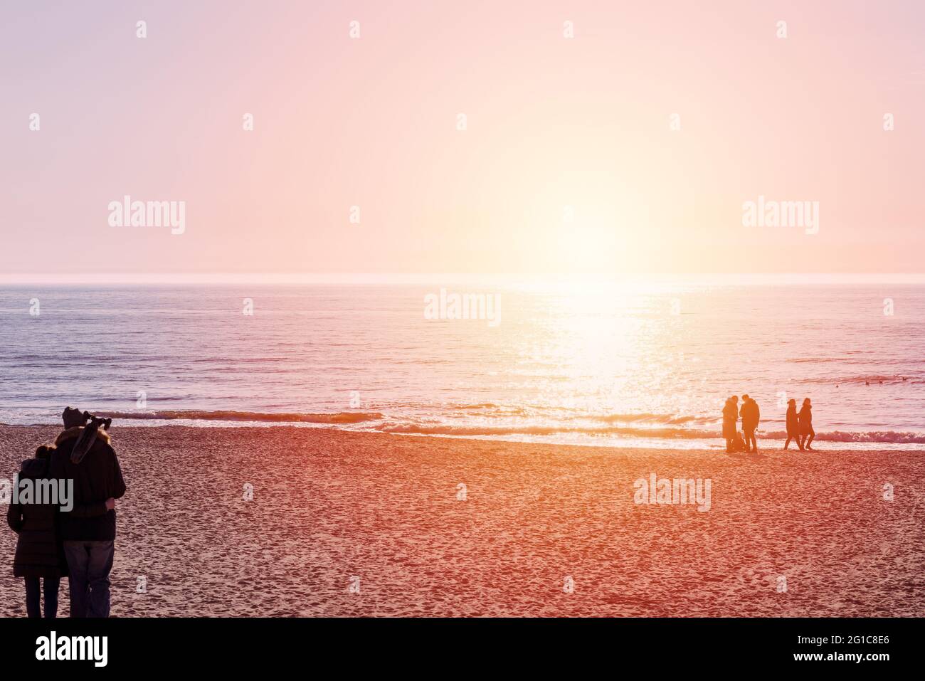 Colorful sunset at a famous marine pier in resort city of Palanga ...