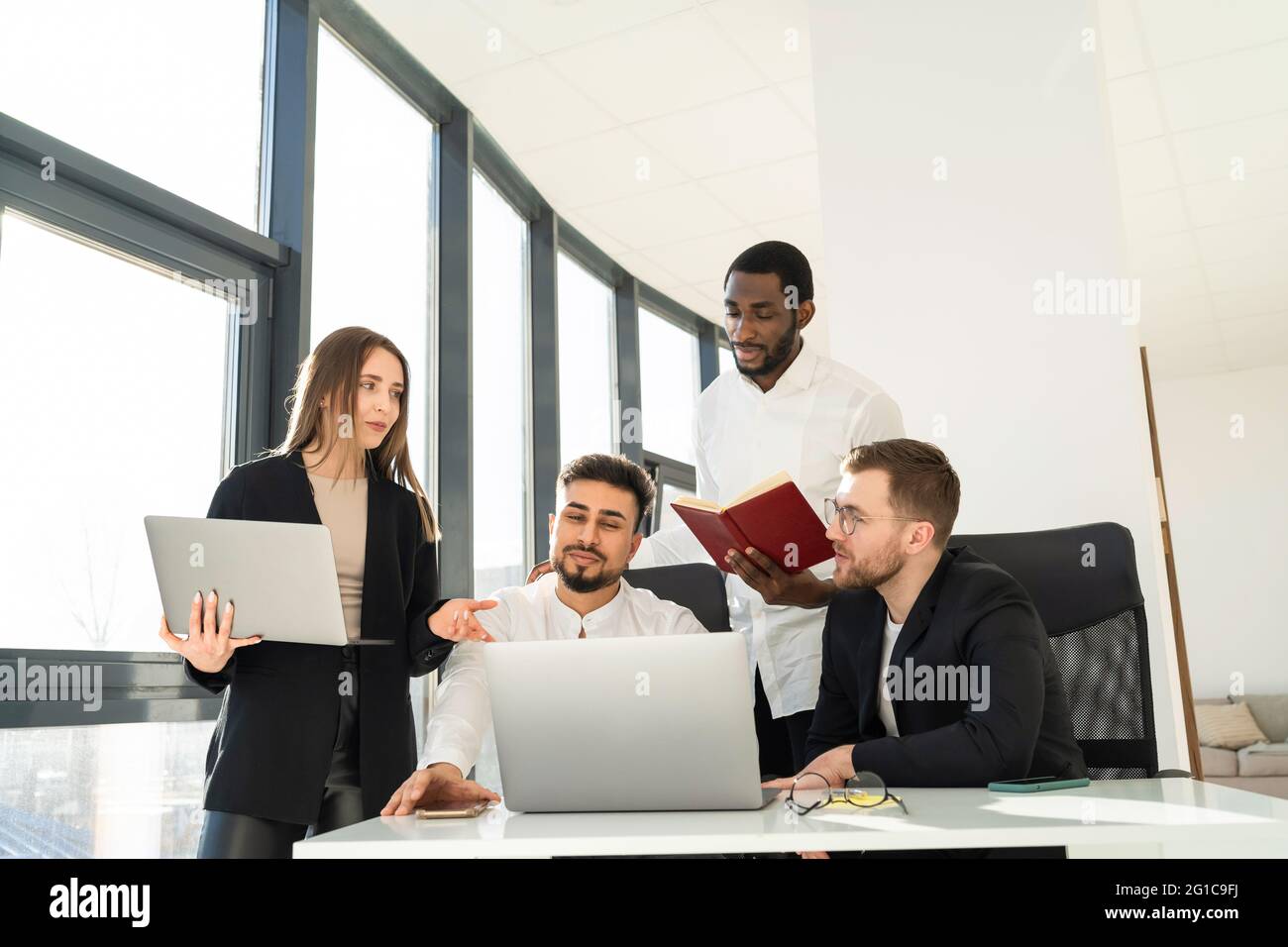 Group working on laptops hi-res stock photography and images - Alamy