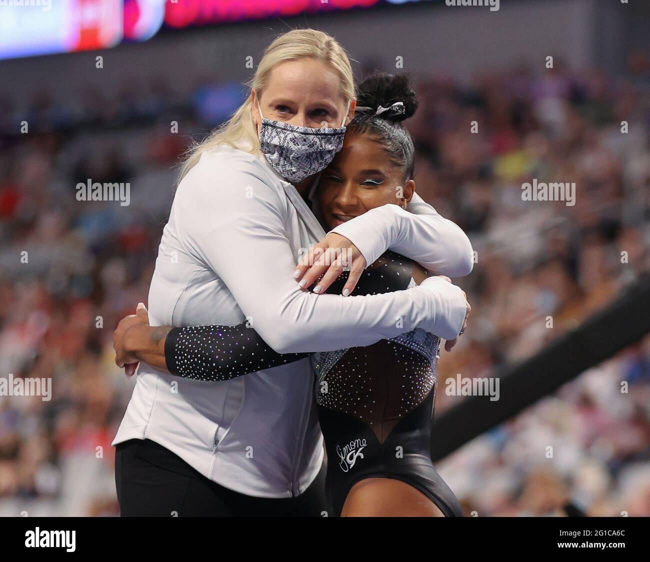 June 6, 2021: Jordan Chiles hugs her coach Cecile Landi after her beam ...