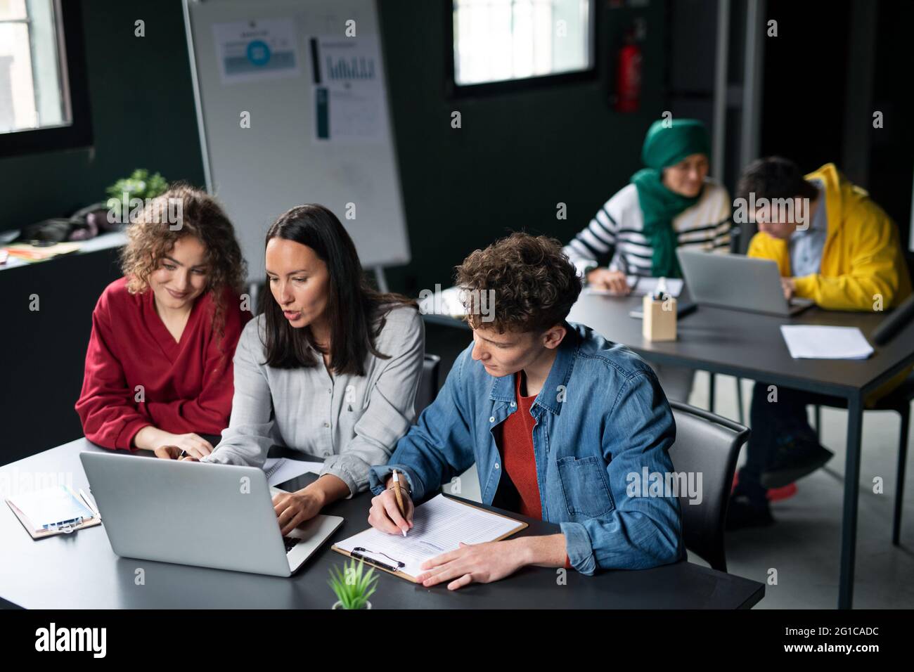 Group of people attending education class in community center Stock ...