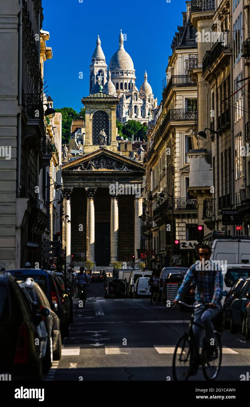 A VIEW OF SACRE COEUR BASILICA AND NOTRE DAME DE LORETTE CHURCH FROM ...