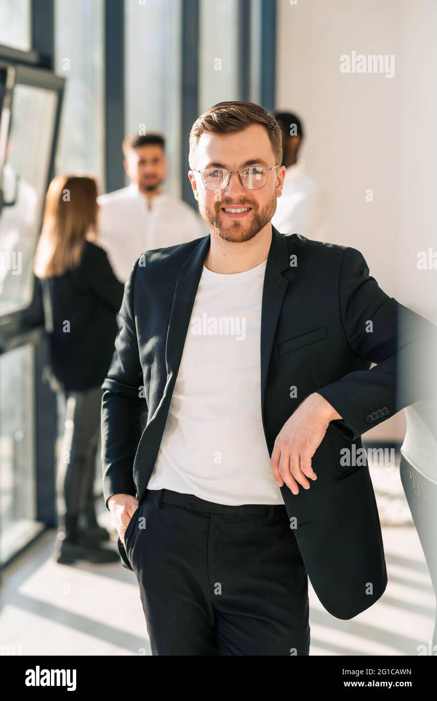 Portrait of handsome company manager Stock Photo - Alamy
