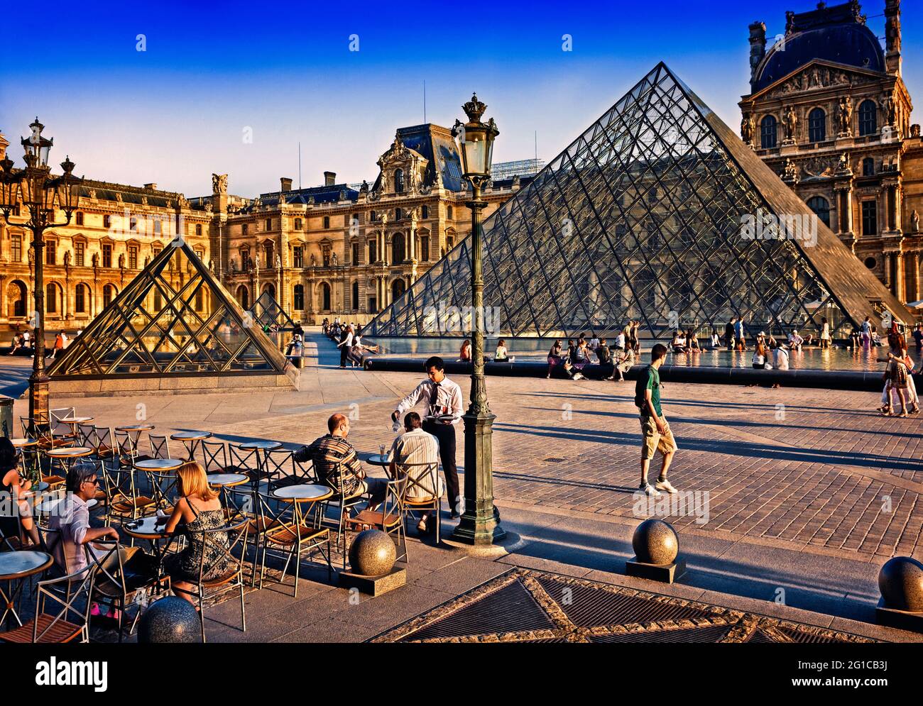 Louvre museum and the pyramid hi-res stock photography and images - Alamy