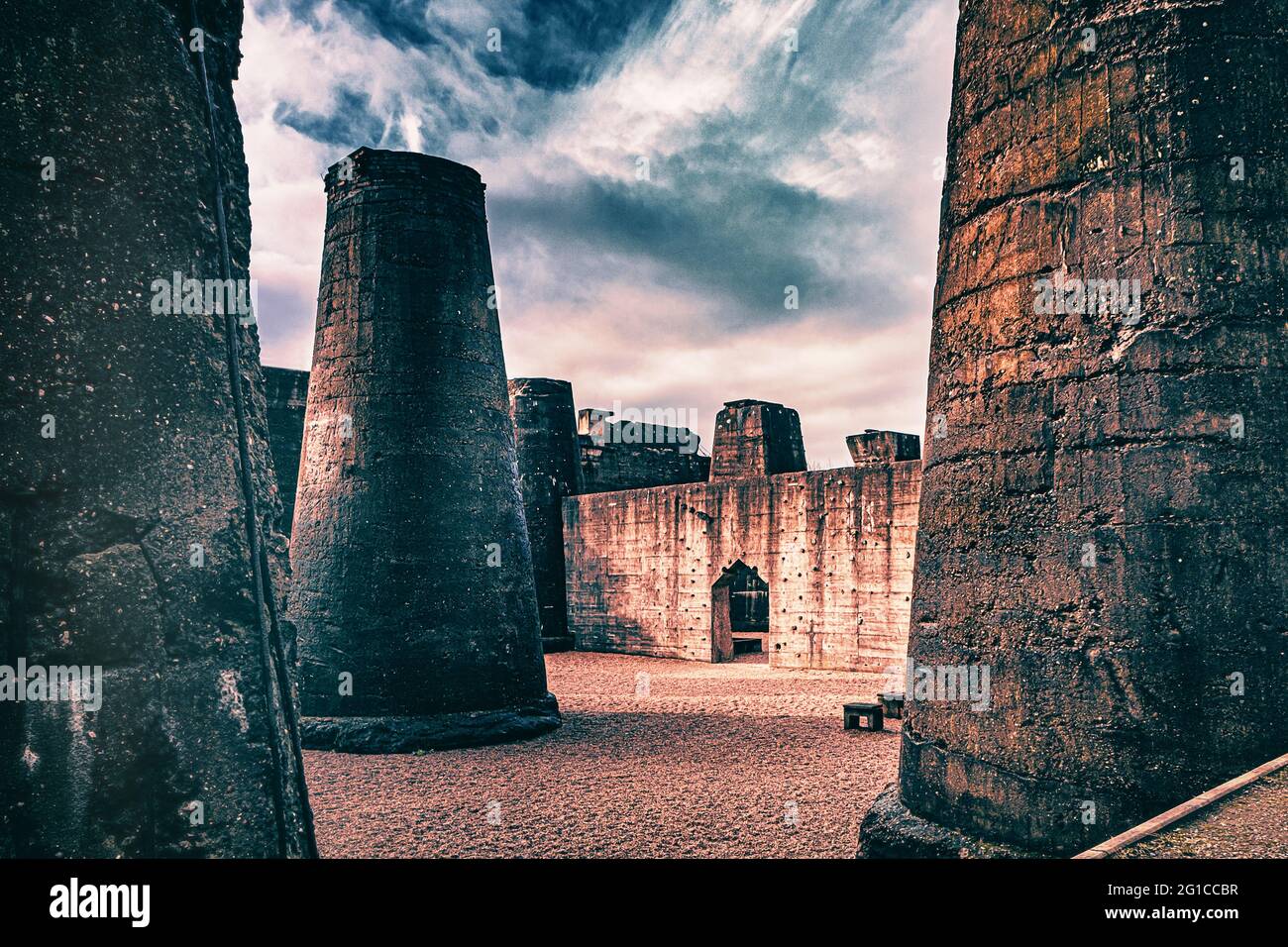 Ironworks in the Ruhr area in dramatic weather. Steelworks, colliery ...