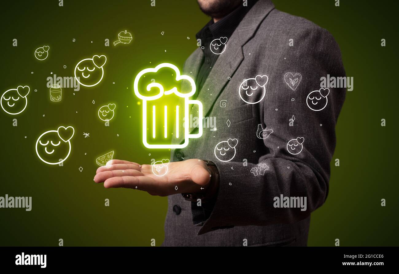 Hand holding food related icons Stock Photo - Alamy