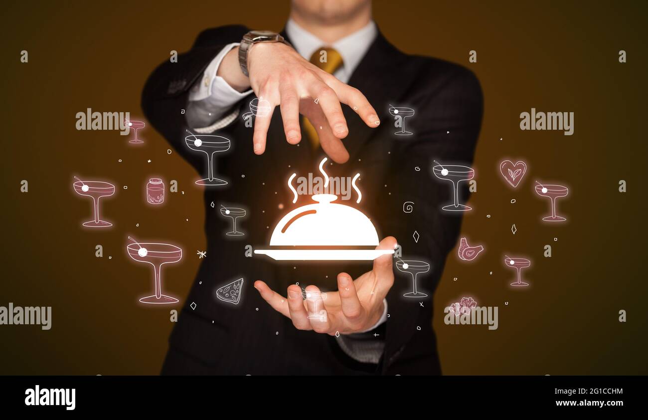 Hand holding food related icons Stock Photo - Alamy