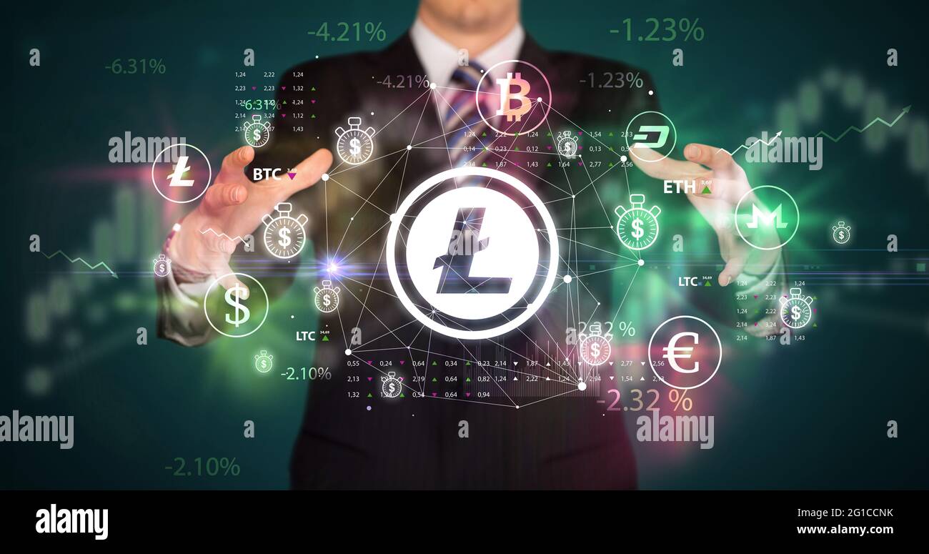 Businessman holding currency symbols concept Stock Photo - Alamy