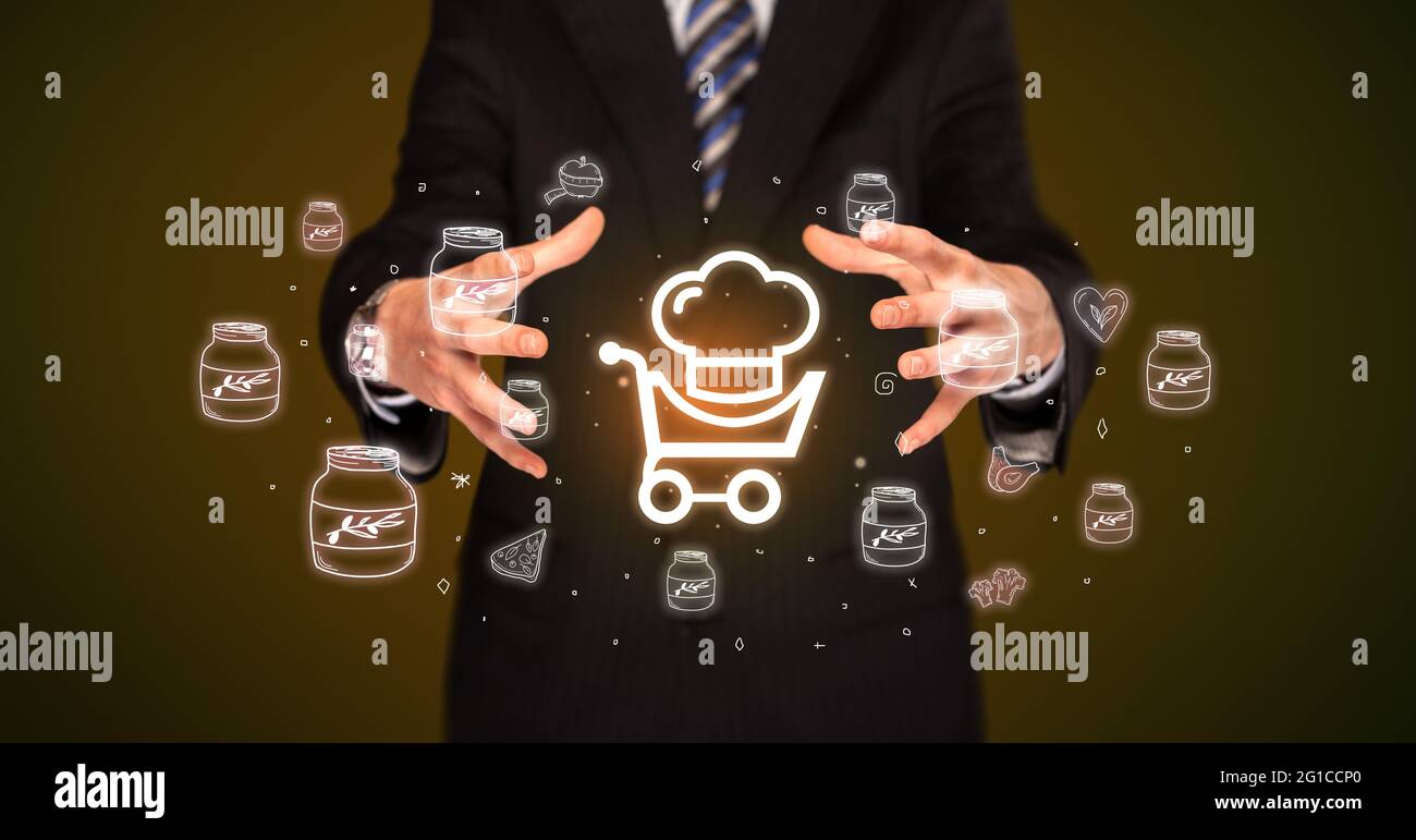 Hand holding food related icons Stock Photo - Alamy
