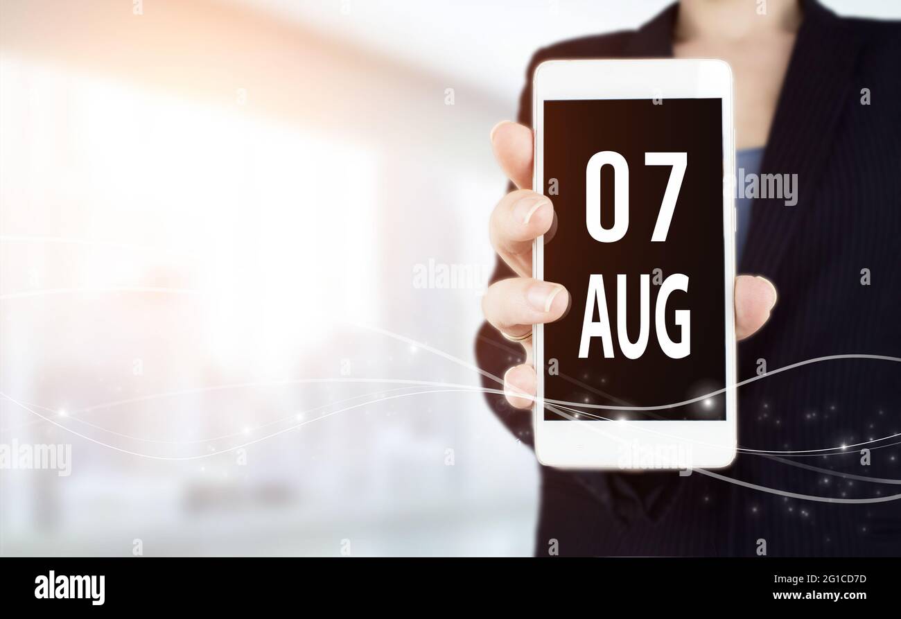 August 7th. Day 7 of month, Calendar date. White smartphone with ...