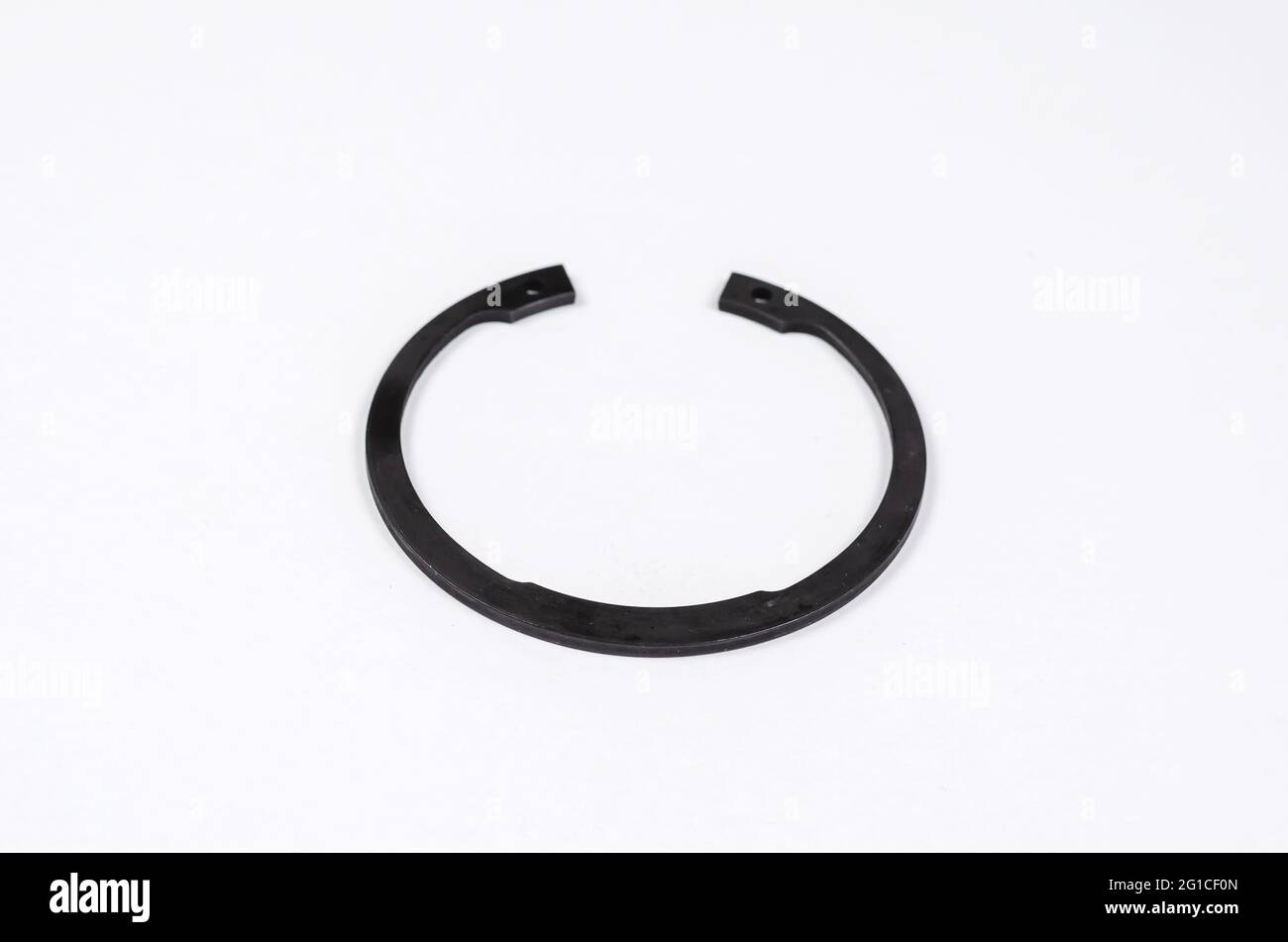 New Locking Ring on white background. Metal round ring made of special ...