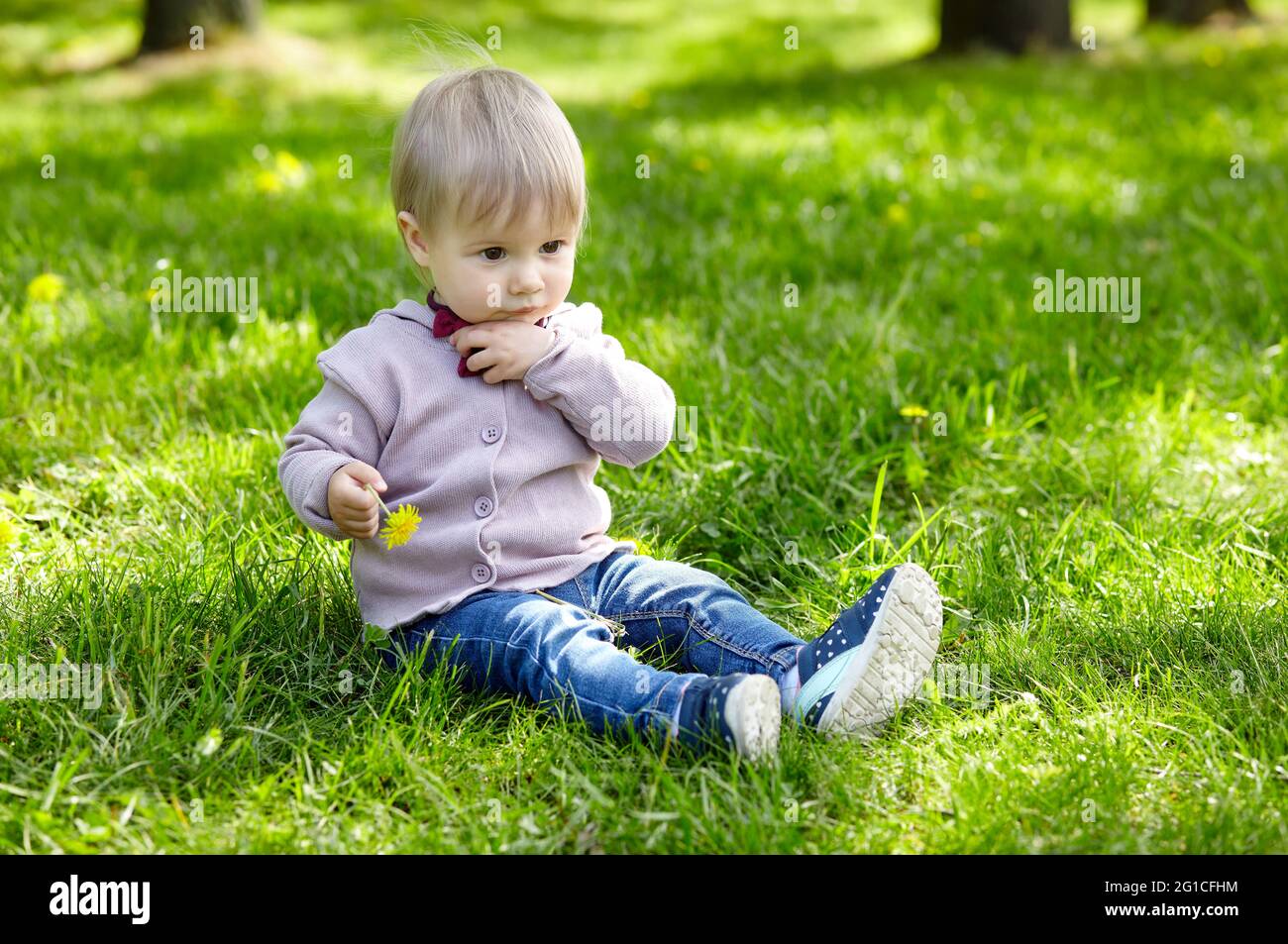 Little girl play in the park and have a good time. The concept of a ...