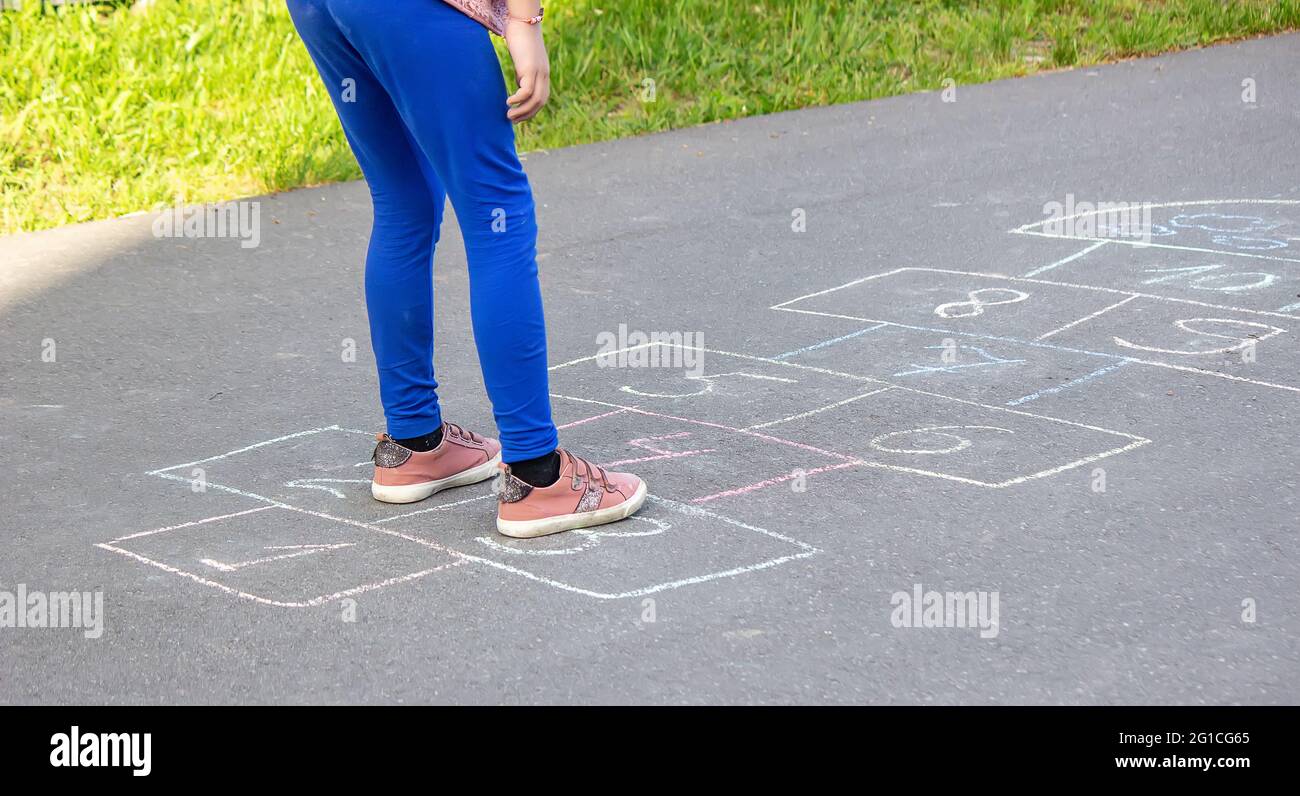 child plays classics in the open air playground, children in the fresh ...