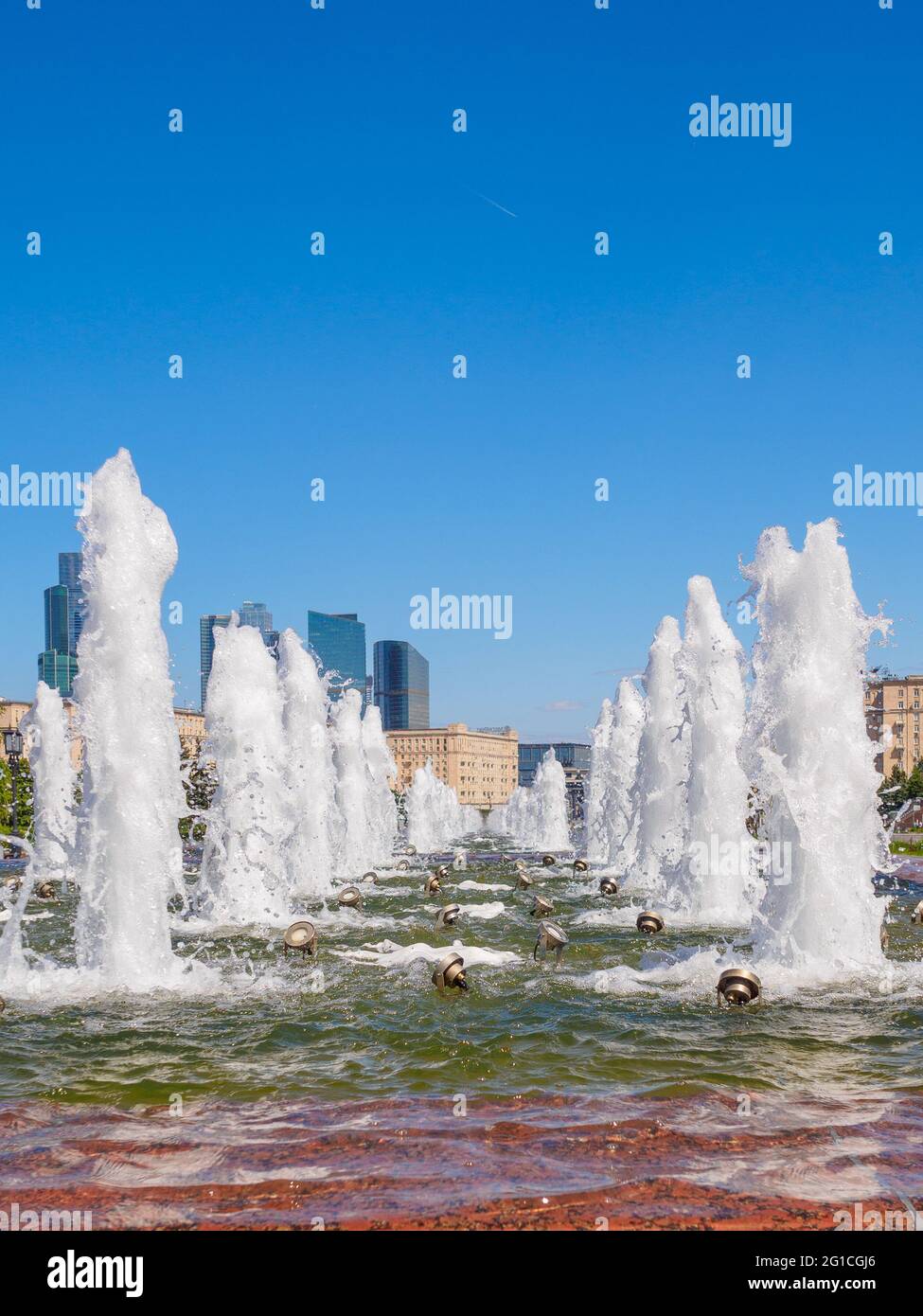 Row water fountains in park hi-res stock photography and images - Alamy