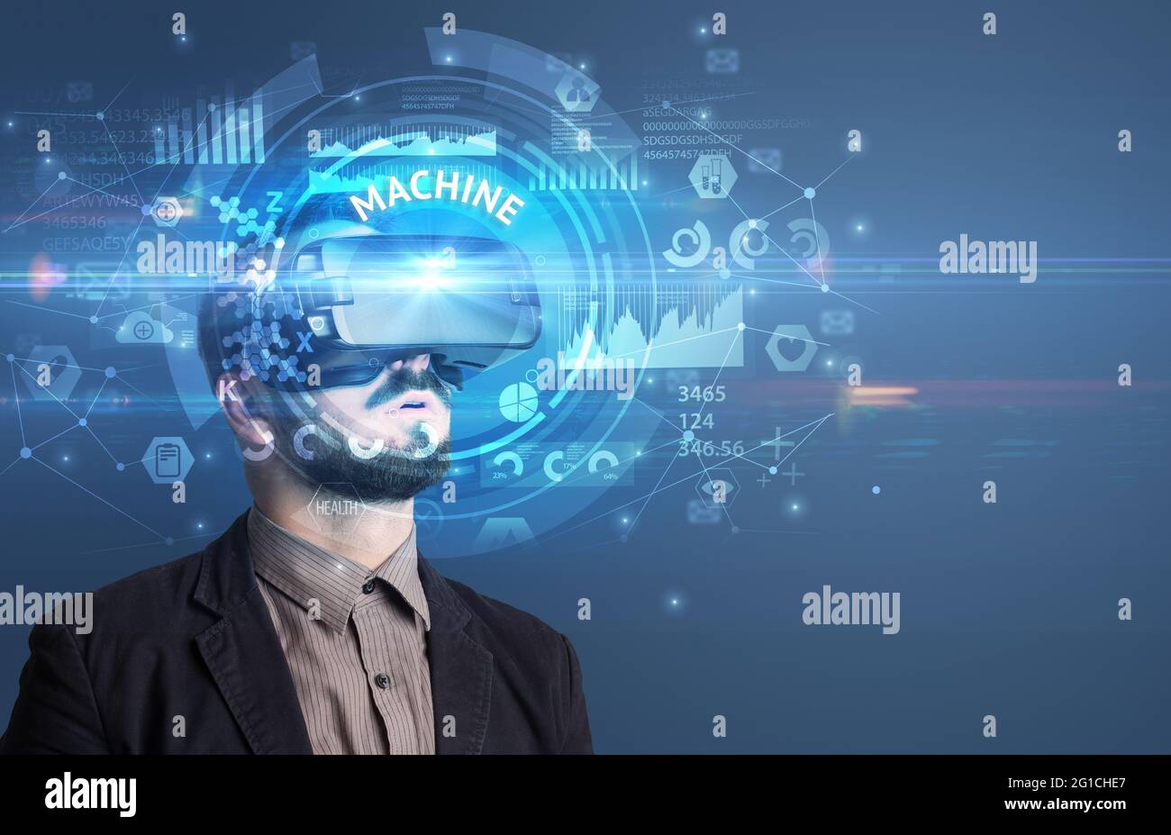 Businessman looking through VR glasses Stock Photo - Alamy