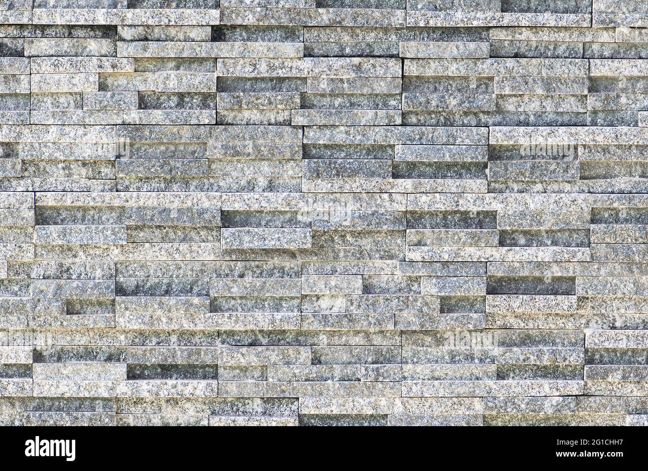 Natural stone granite pieces tiles for walls Stock Photo - Alamy