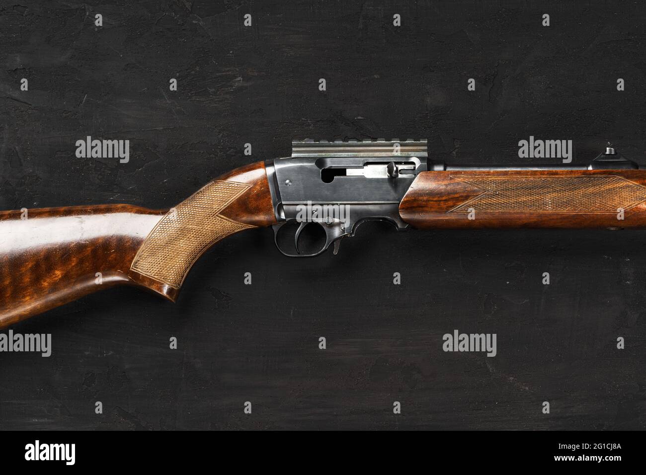 Smoothbore hunting gun on black background close up Stock Photo - Alamy