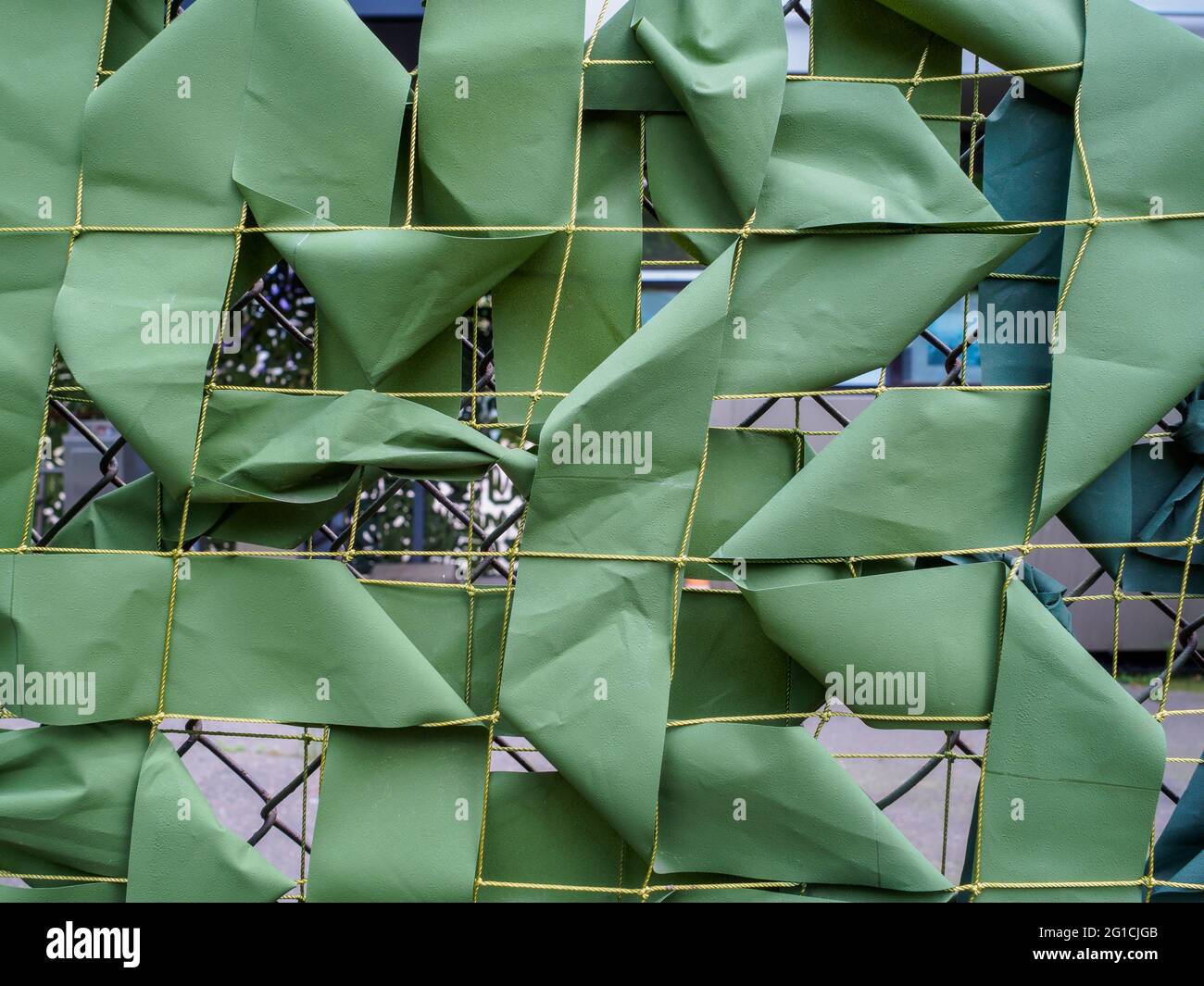Green military camouflage net close-up. Abstract background Stock Photo ...
