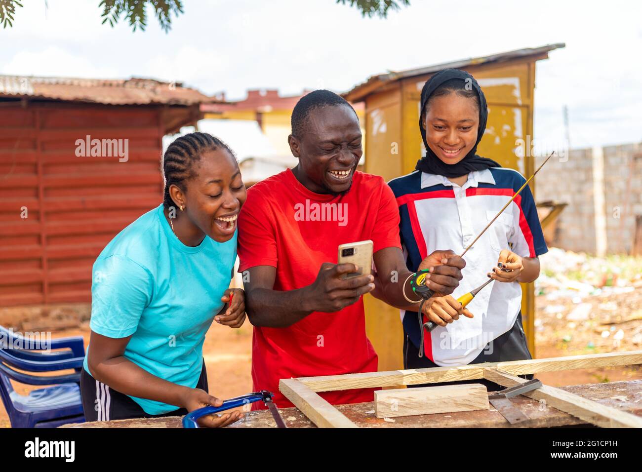 african carpenter and his workers got excited about what they saw on ...
