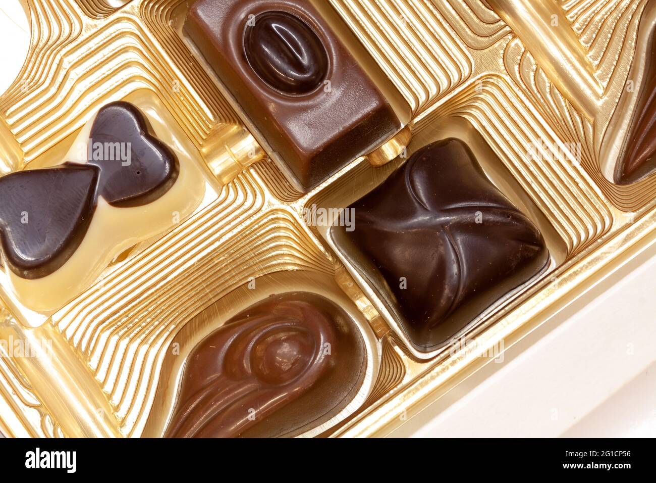 Chocolate candies in a box Stock Photo - Alamy
