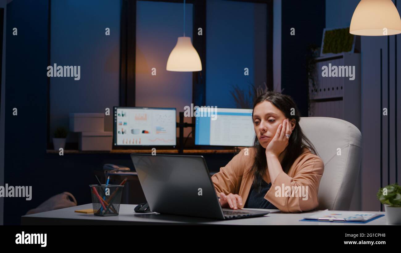 Stressed woman working laptop typing hi-res stock photography and ...