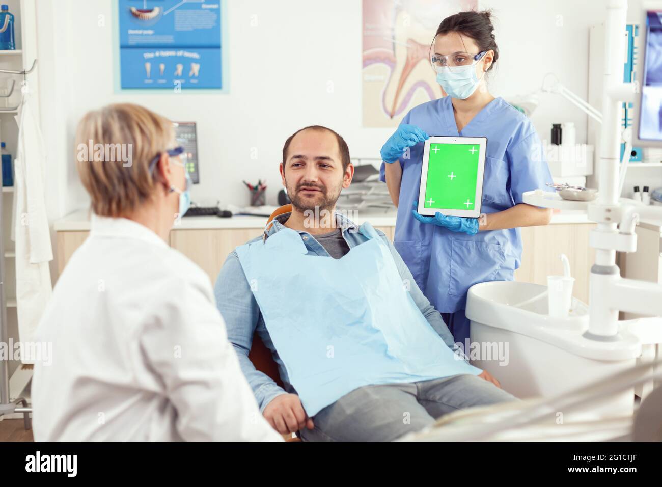 Dentist using green screen on hi-res stock photography and images - Alamy