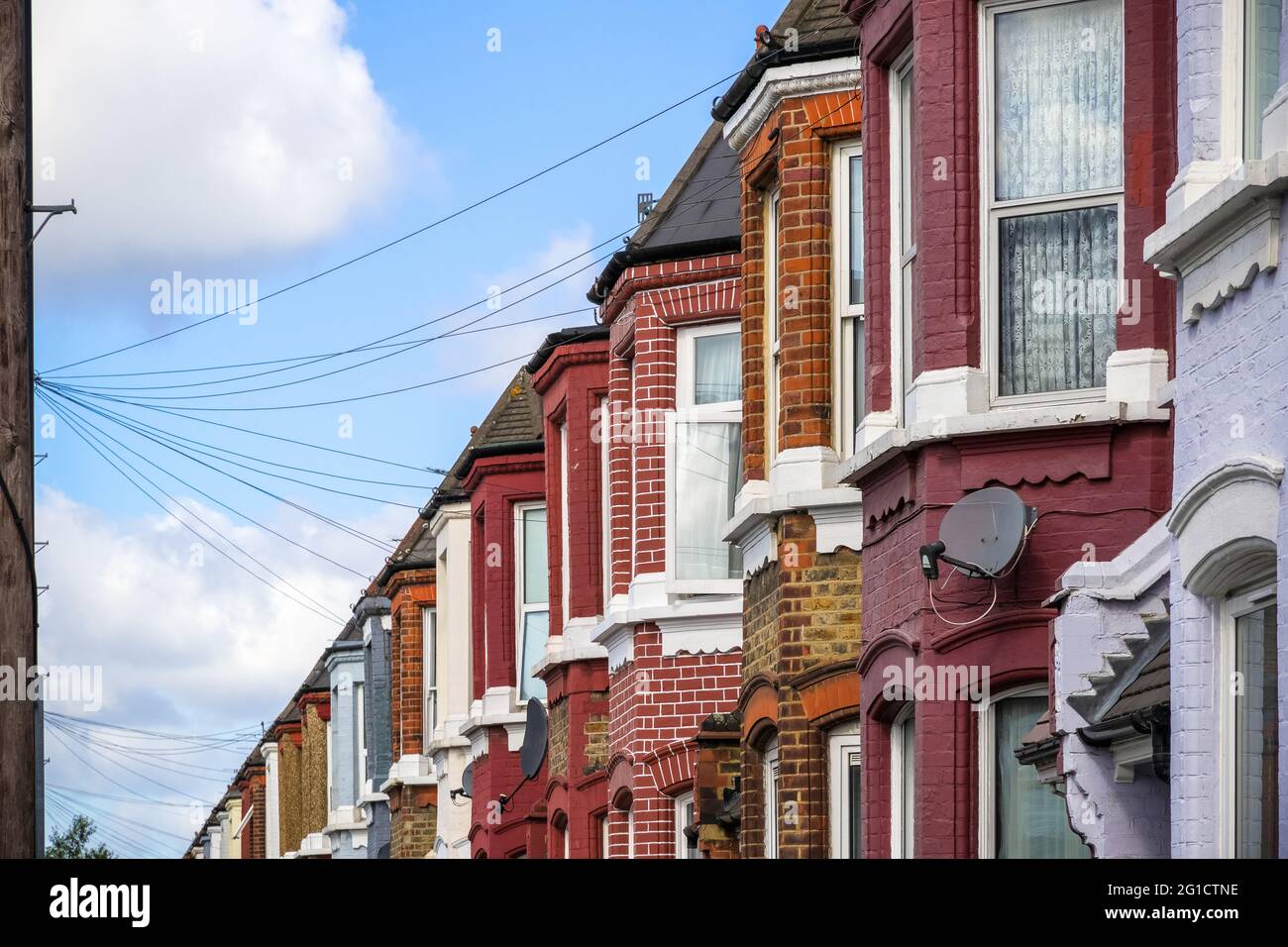 A row of typical English terraced houses around Kensal Rise in London ...