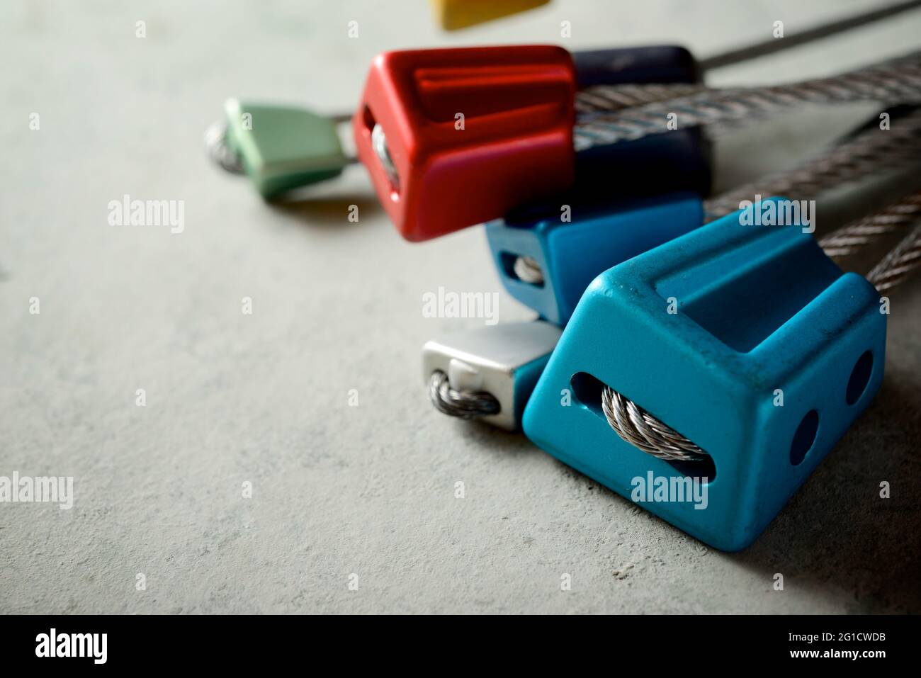 Nuts used in climbing on a table Stock Photo - Alamy