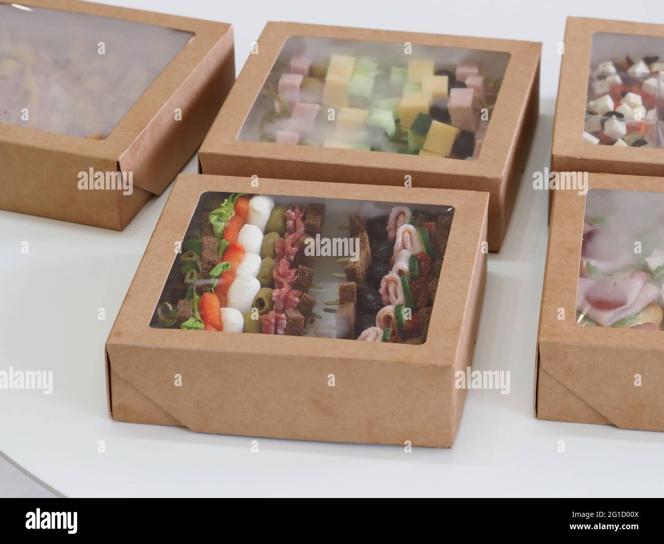 set sandwiches in cardboard packaging in portions in catering services ...