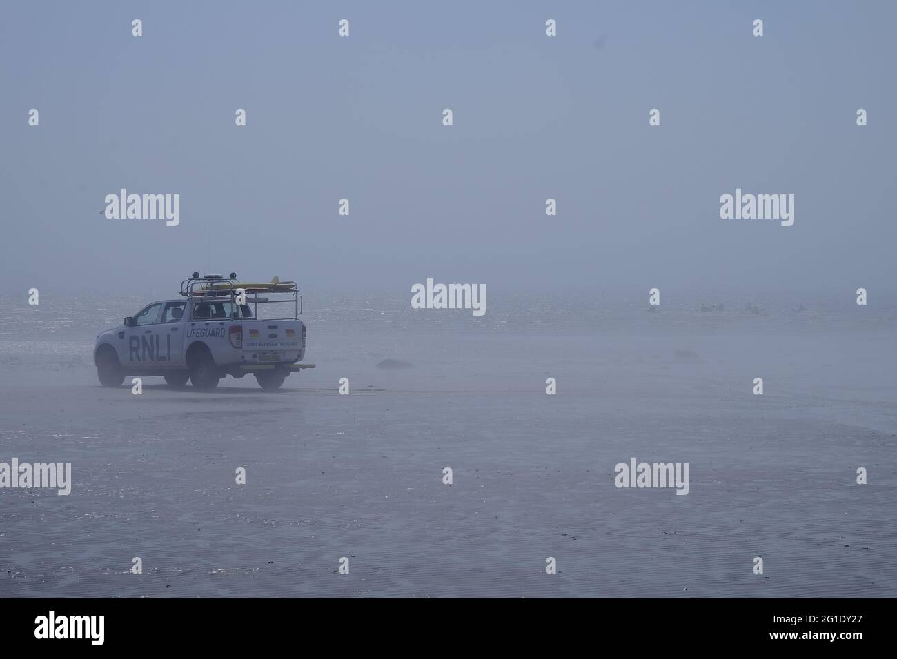 RNLI truck in sea mist Stock Photo - Alamy