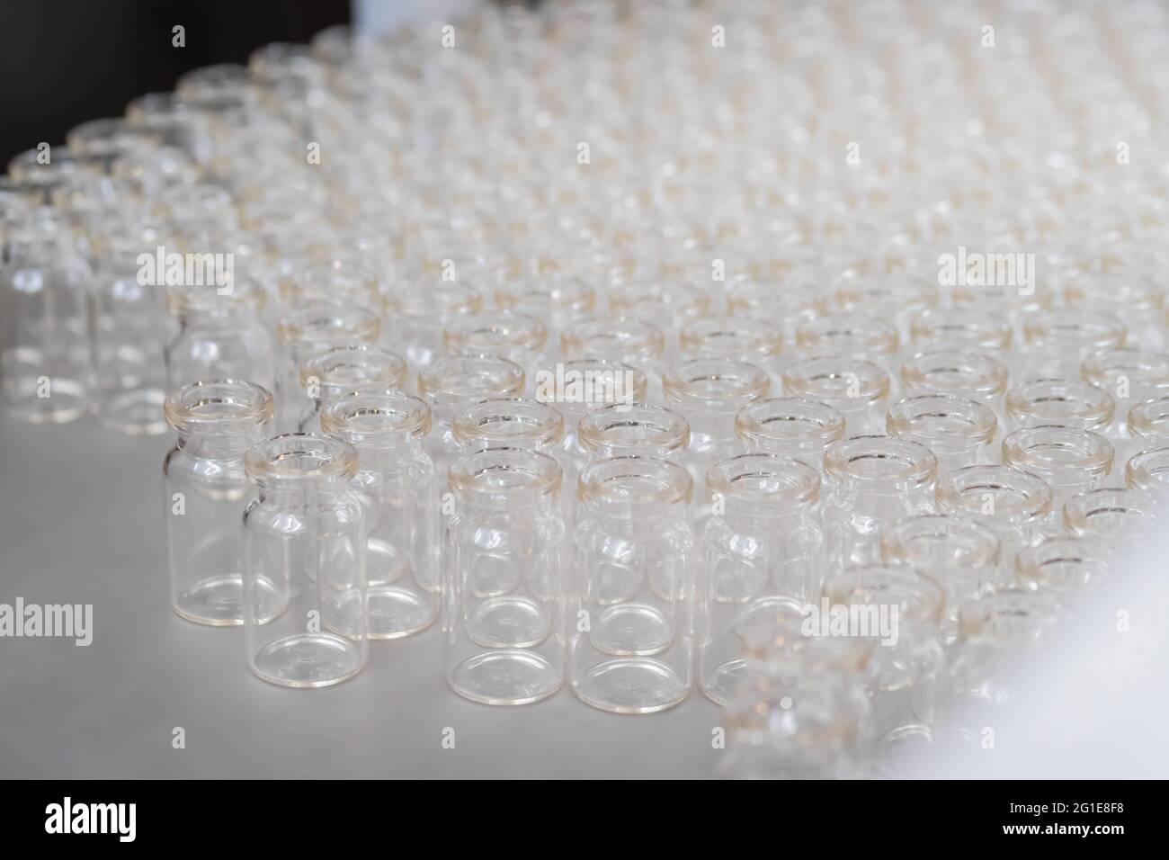Many empty medical injection glass vials Stock Photo - Alamy