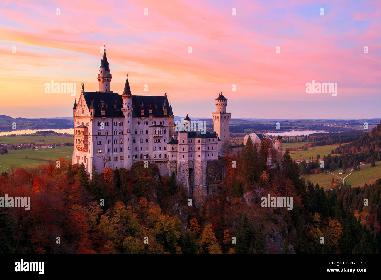 Famous Neuschwanstein castle in beautiful autumn colors in Bavaria and ...
