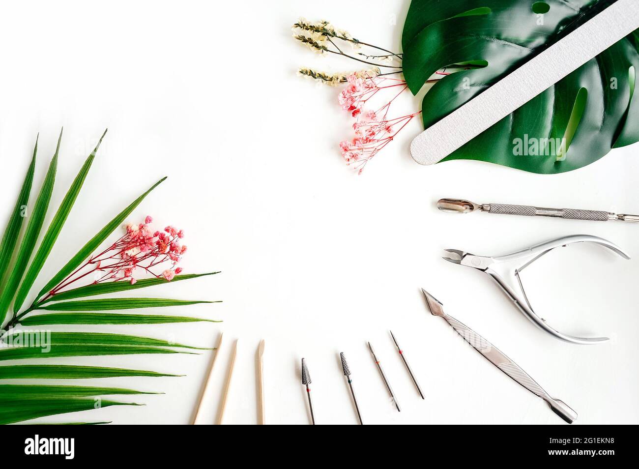 Tools of manicure set on white background as frame. Flat lay, copy ...