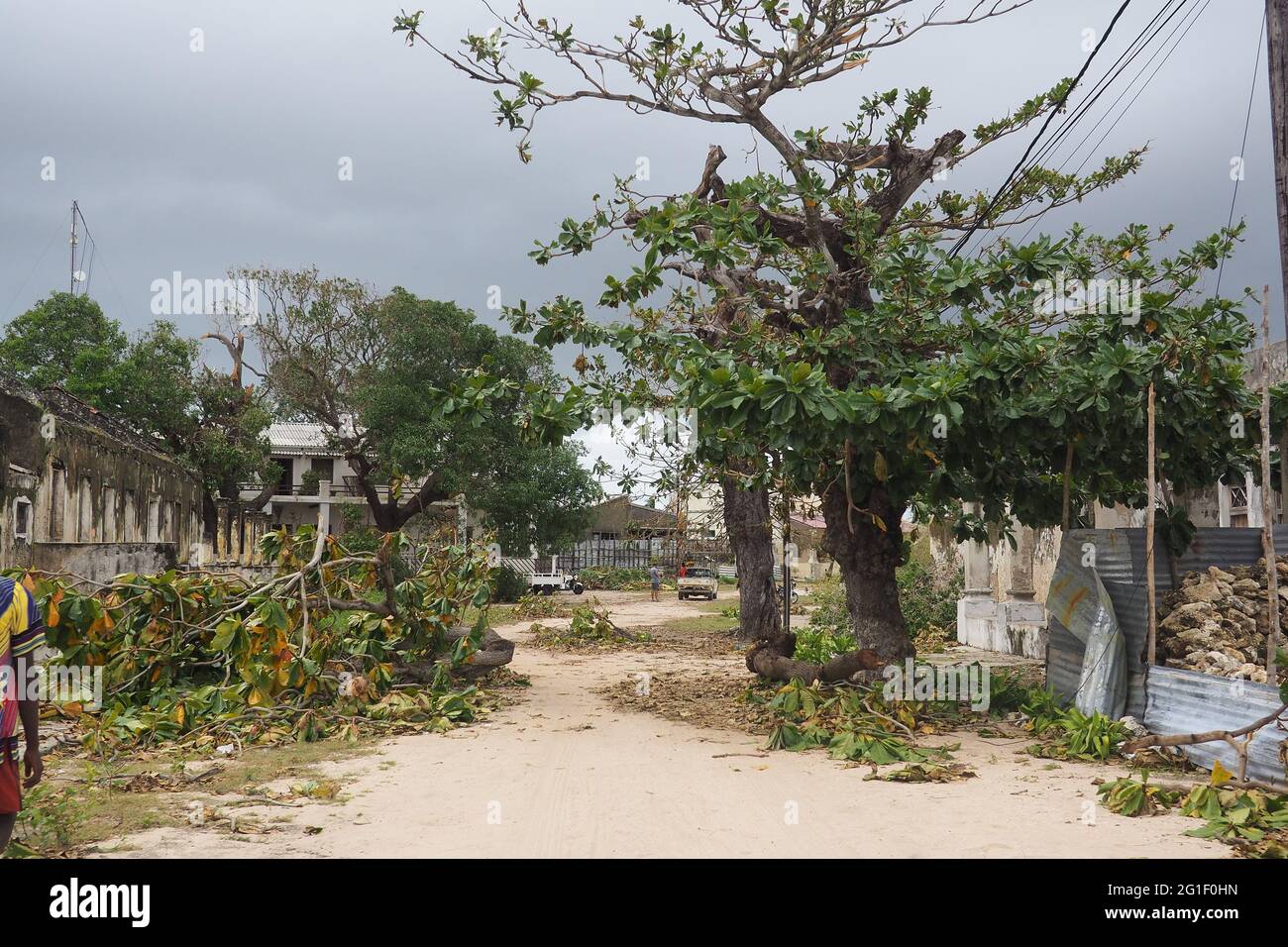 Damaged houses and roads after a cyclone in small african town of Pemba ...