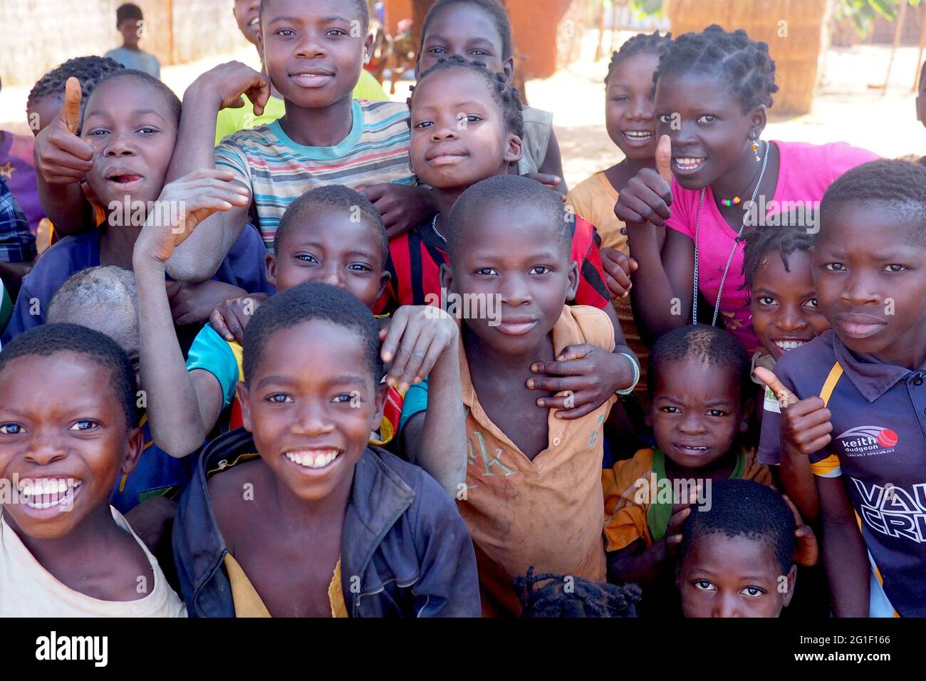 Group of smiling children in African village Stock Photo - Alamy