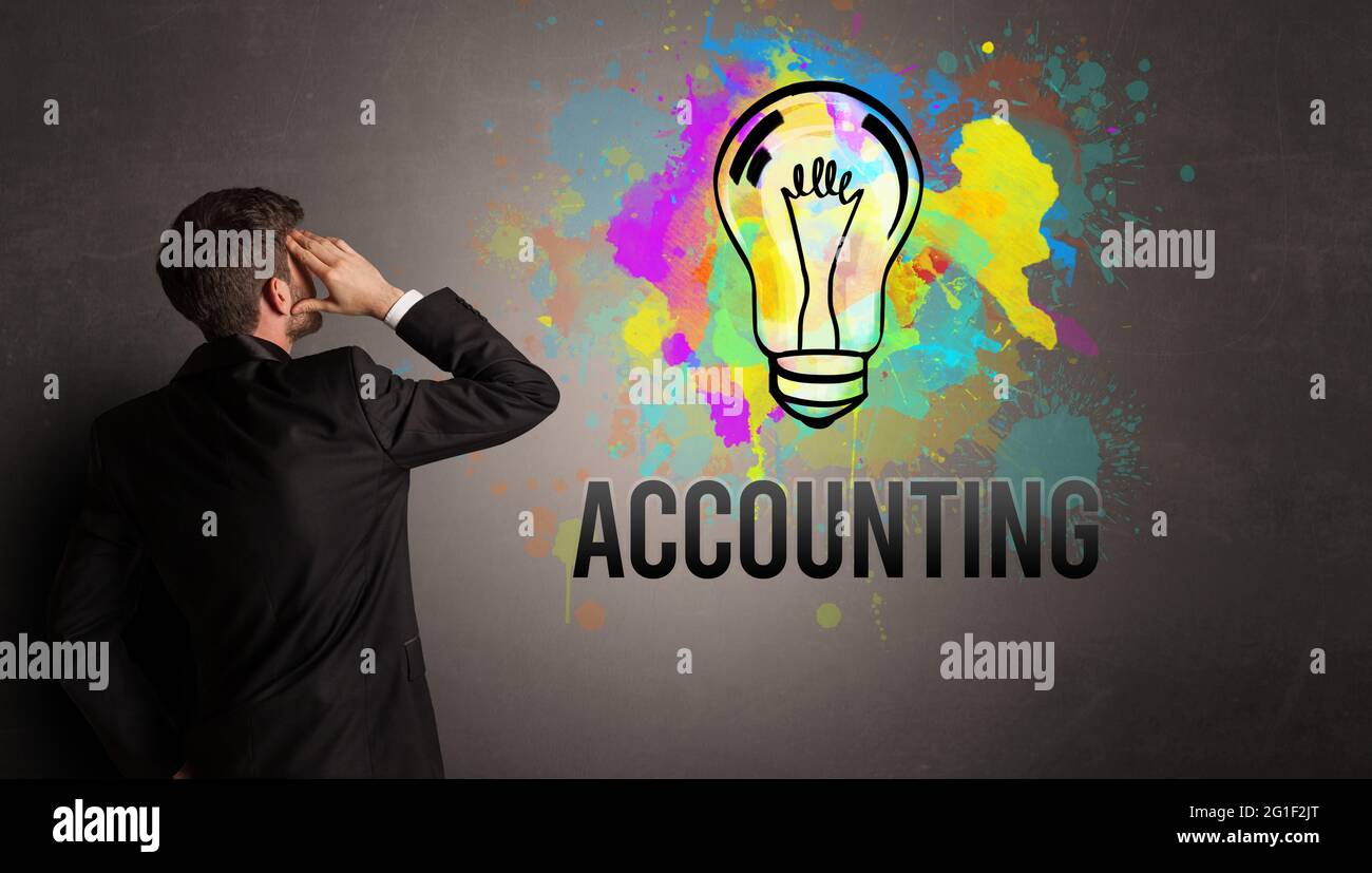 businessman drawing colorful light bulb Stock Photo - Alamy
