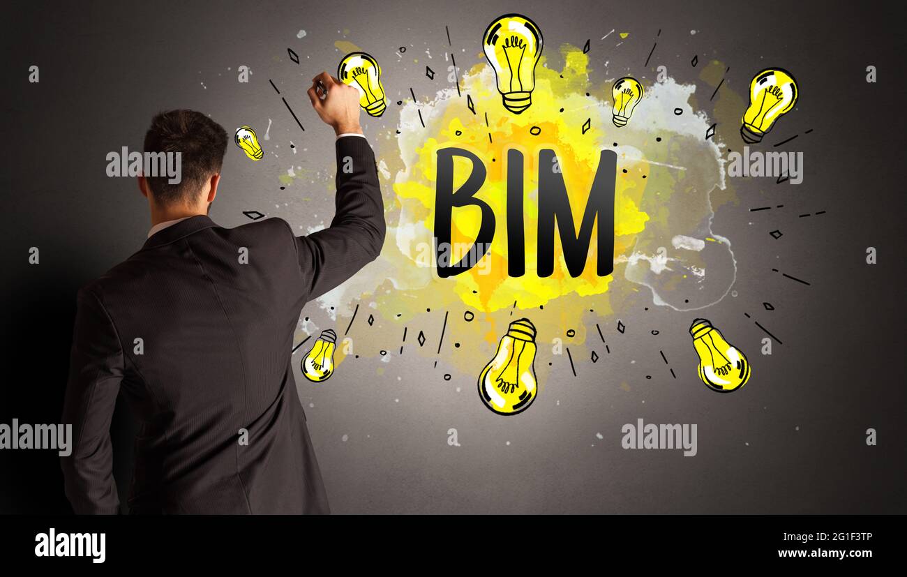 man drawing colorful light bulb Stock Photo - Alamy