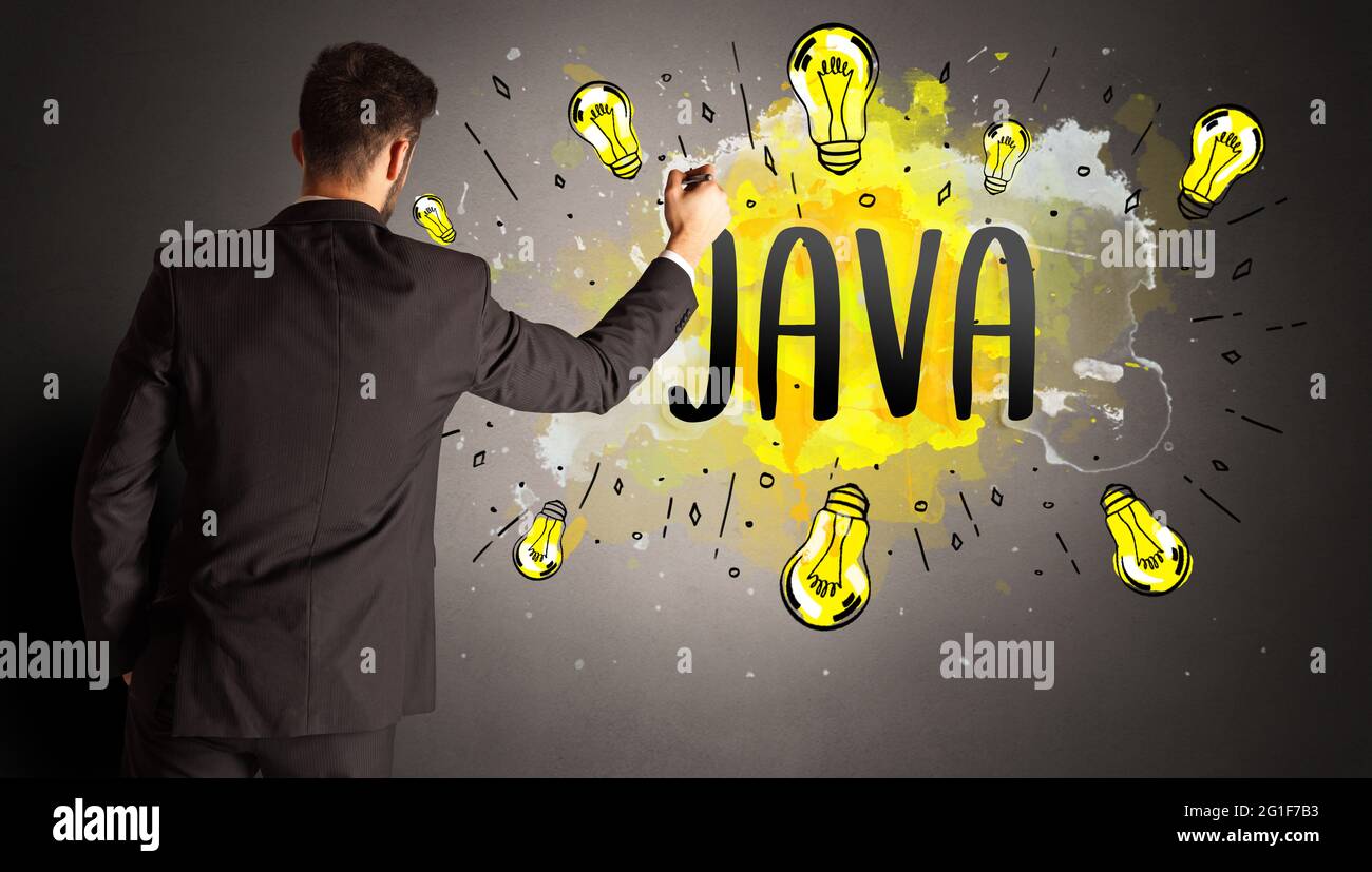 man drawing colorful light bulb Stock Photo - Alamy