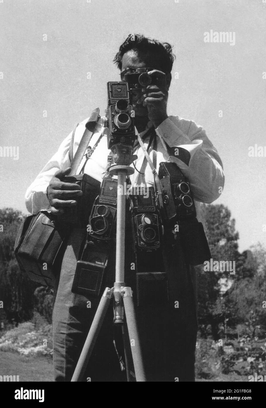 1960s photographer taking picture hi-res stock photography and images ...