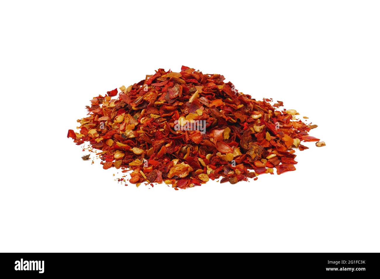 heap of ground dried chili pepper flakes isolated on white background ...