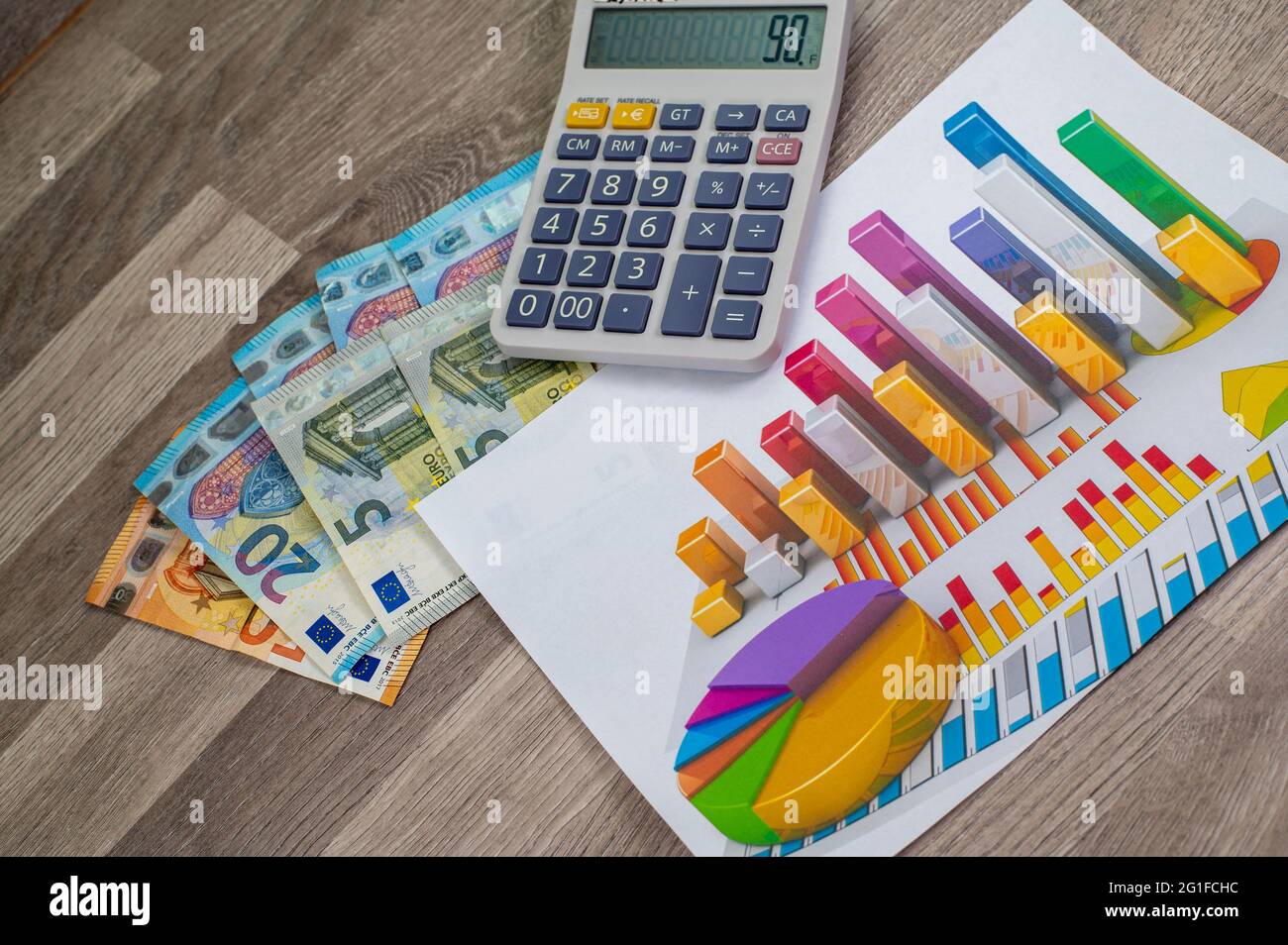 business in the office with euro banknotes and calculator on the table ...