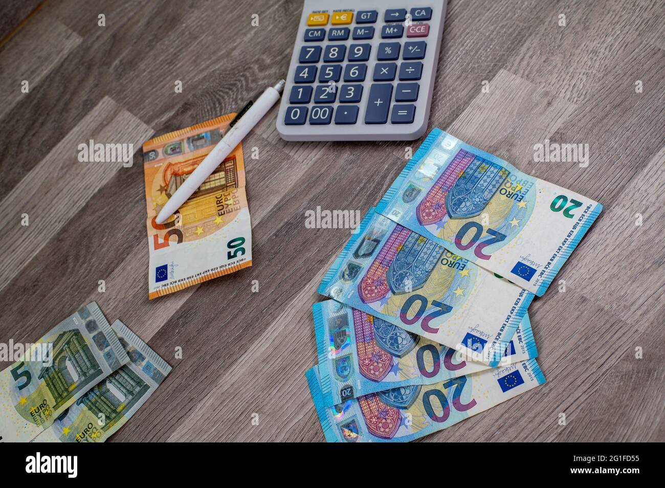 business in the office with euro banknotes and calculator on the table ...