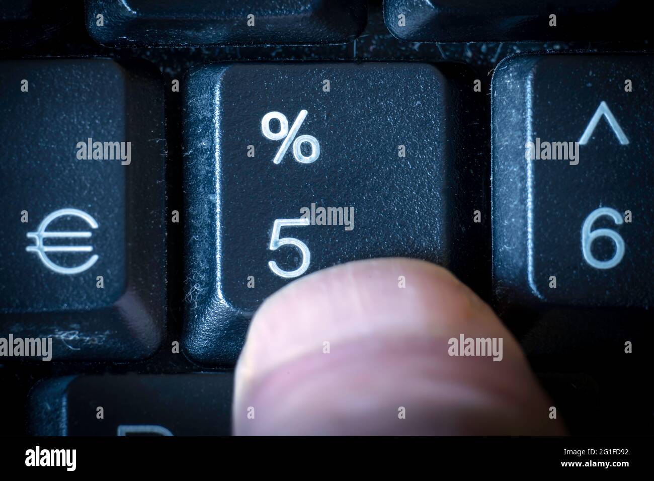 Finger press 5 on keyboard Stock Photo - Alamy