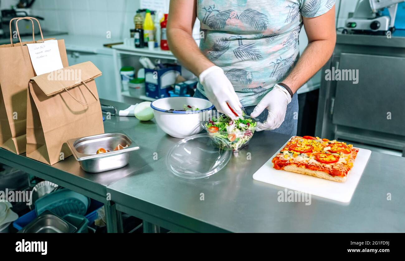Takeaway orders kitchen hi-res stock photography and images - Alamy