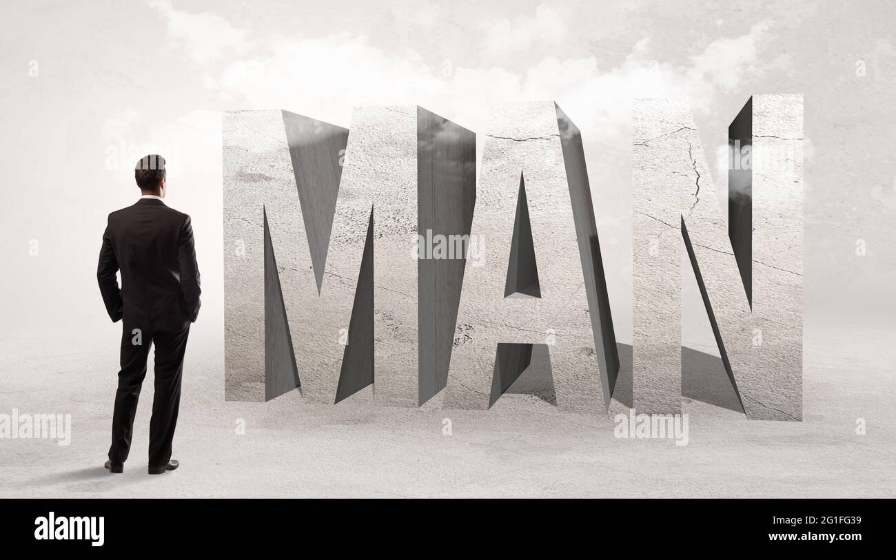 Rear view of a businessman standing in front of abbreviation Stock ...